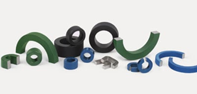 Micro coil core materials: from amorphous to neodymium